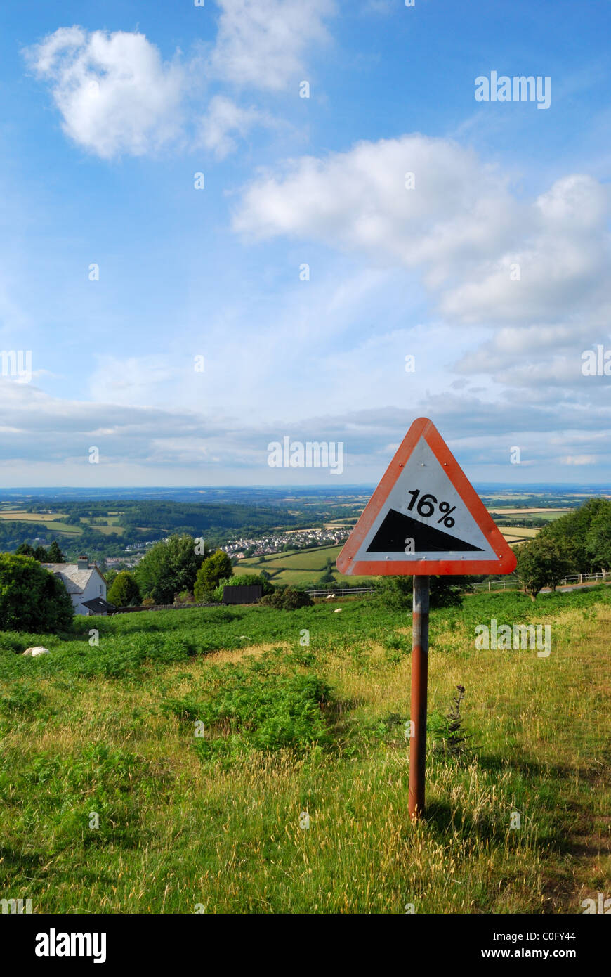 View across Devon from Dartmoor including 16% road sign in foreground ...