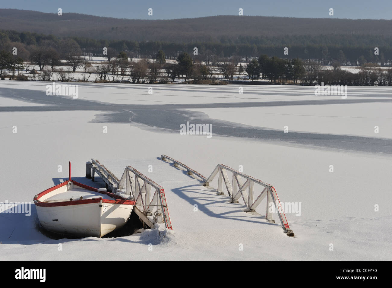 bridge and boat in winter Stock Photo - Alamy