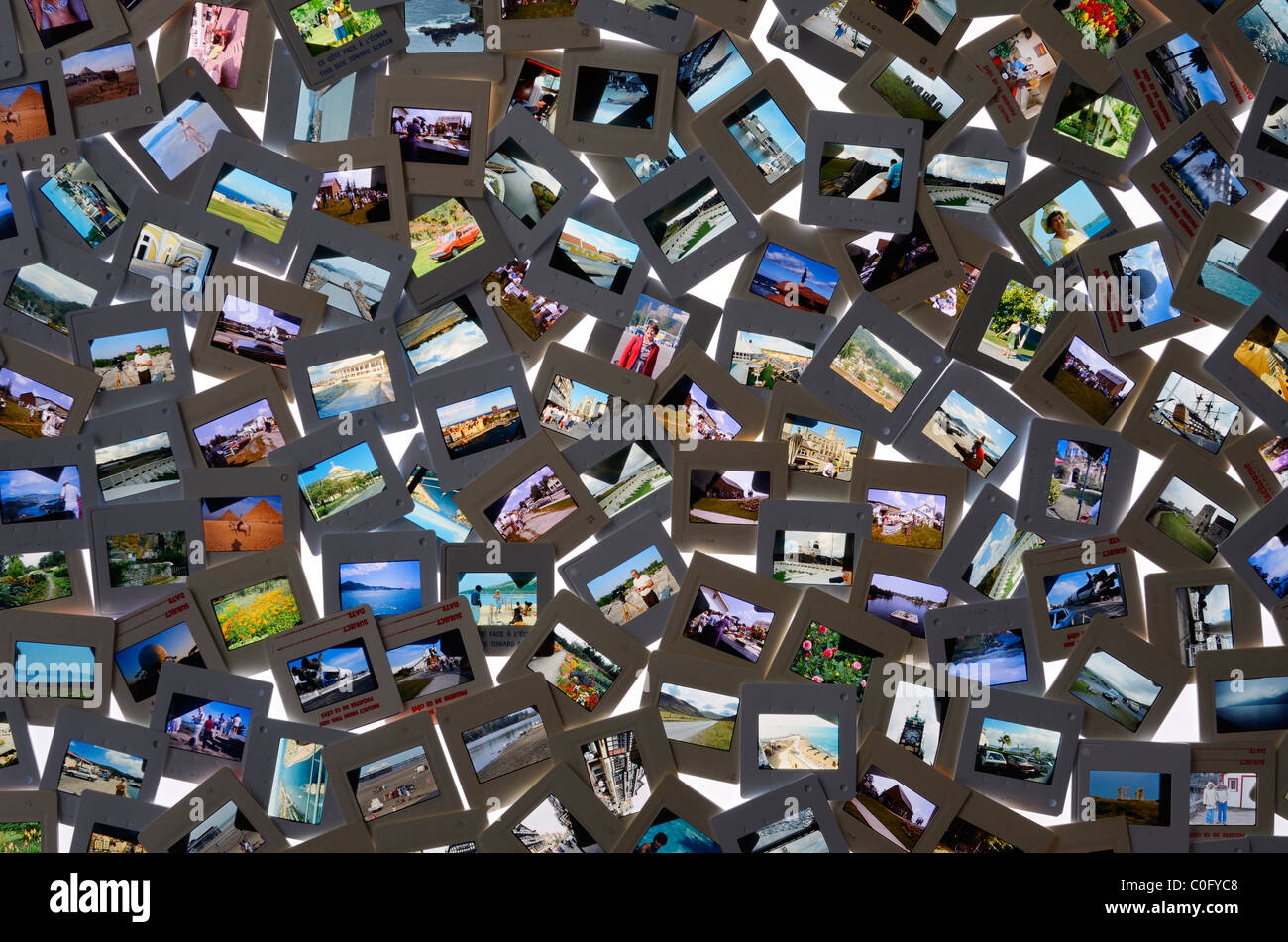 Top view of collection of film slide snapshot pictures on a light table ...
