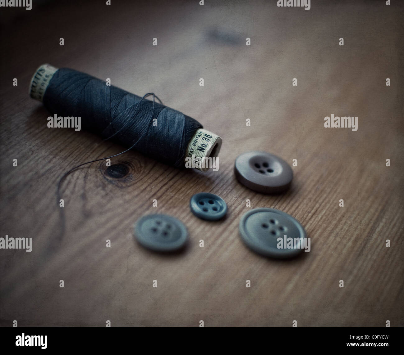 Buttons and thread Stock Photo - Alamy