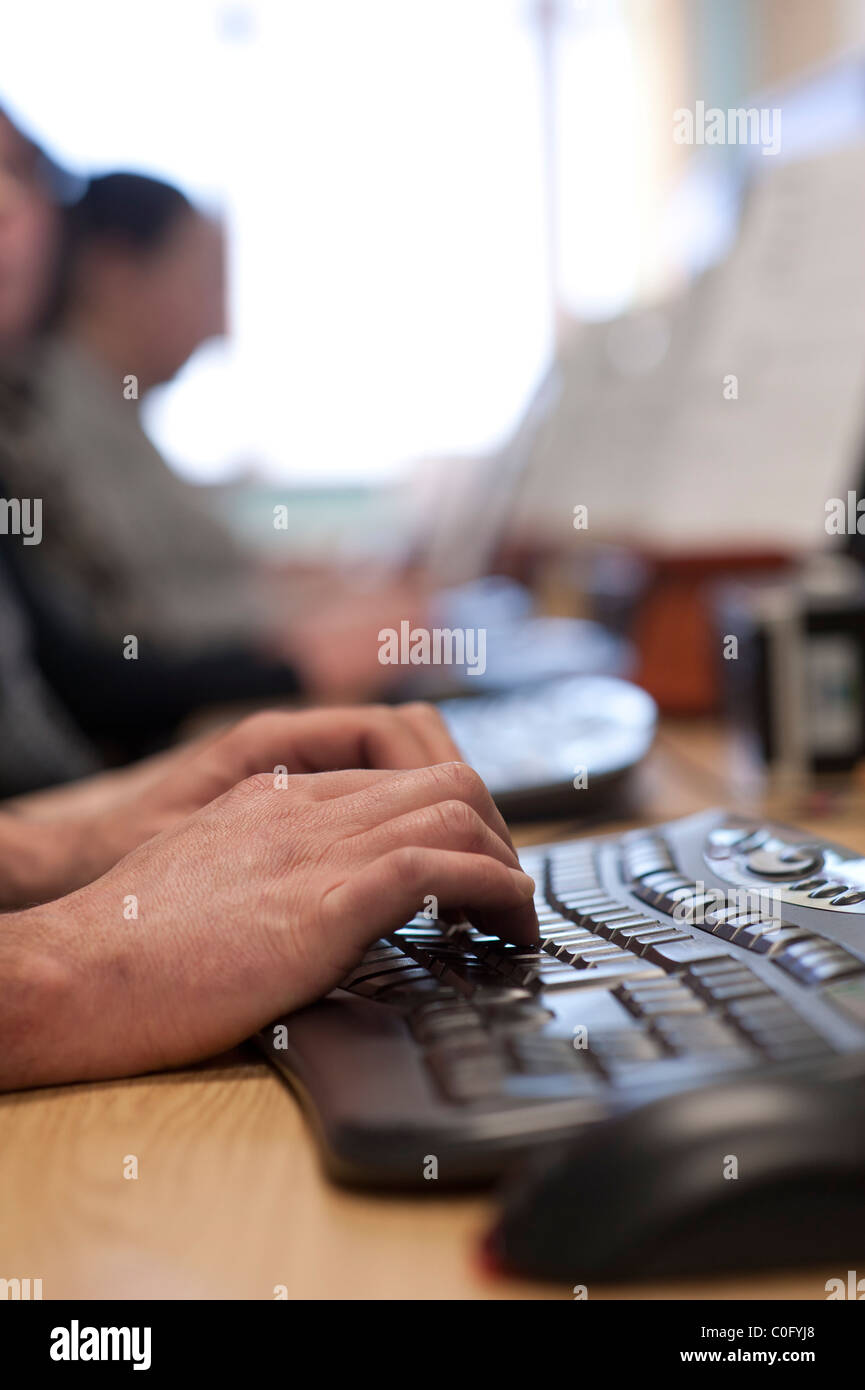 Adults learning to touch type at a college of further education UK ...
