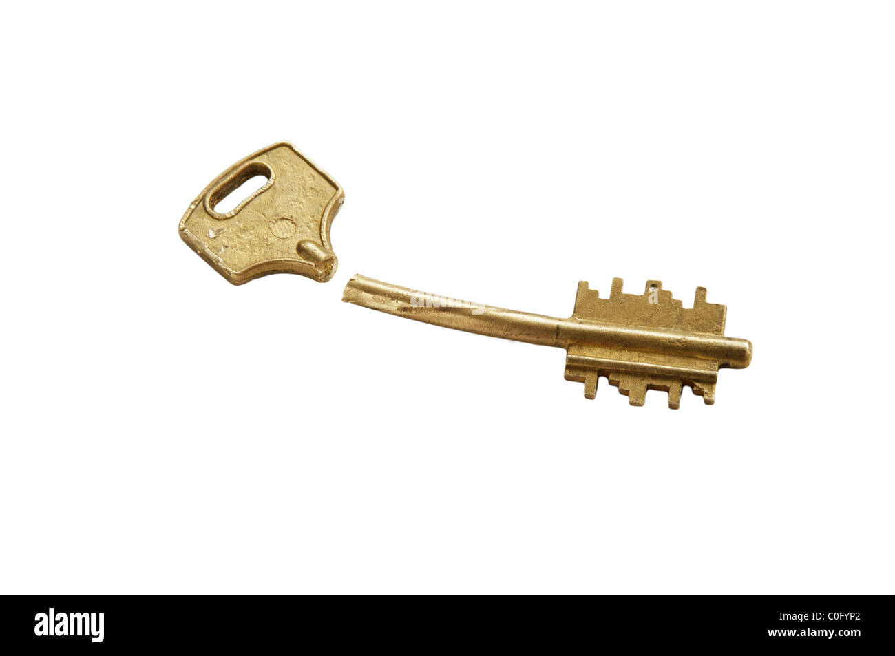 golden broken key on white background isoleted Stock Photo - Alamy