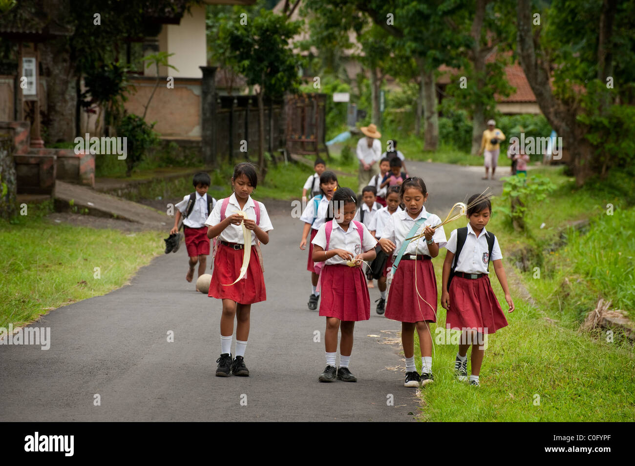 Smiling and happy Balinese children from a village in east Bali called ...