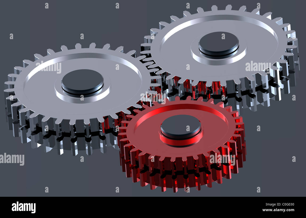 Two steel gears in connection with red one. Concept for teamwork and ...
