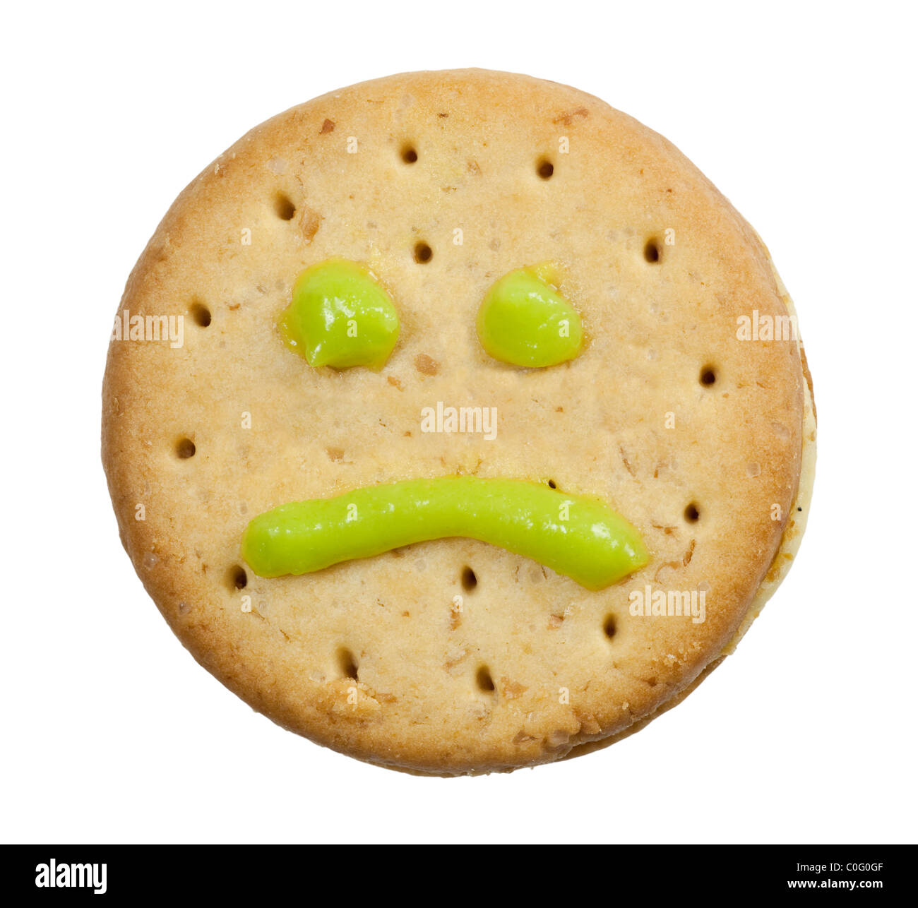 Biscuit with sad face isolated on white background Stock Photo - Alamy