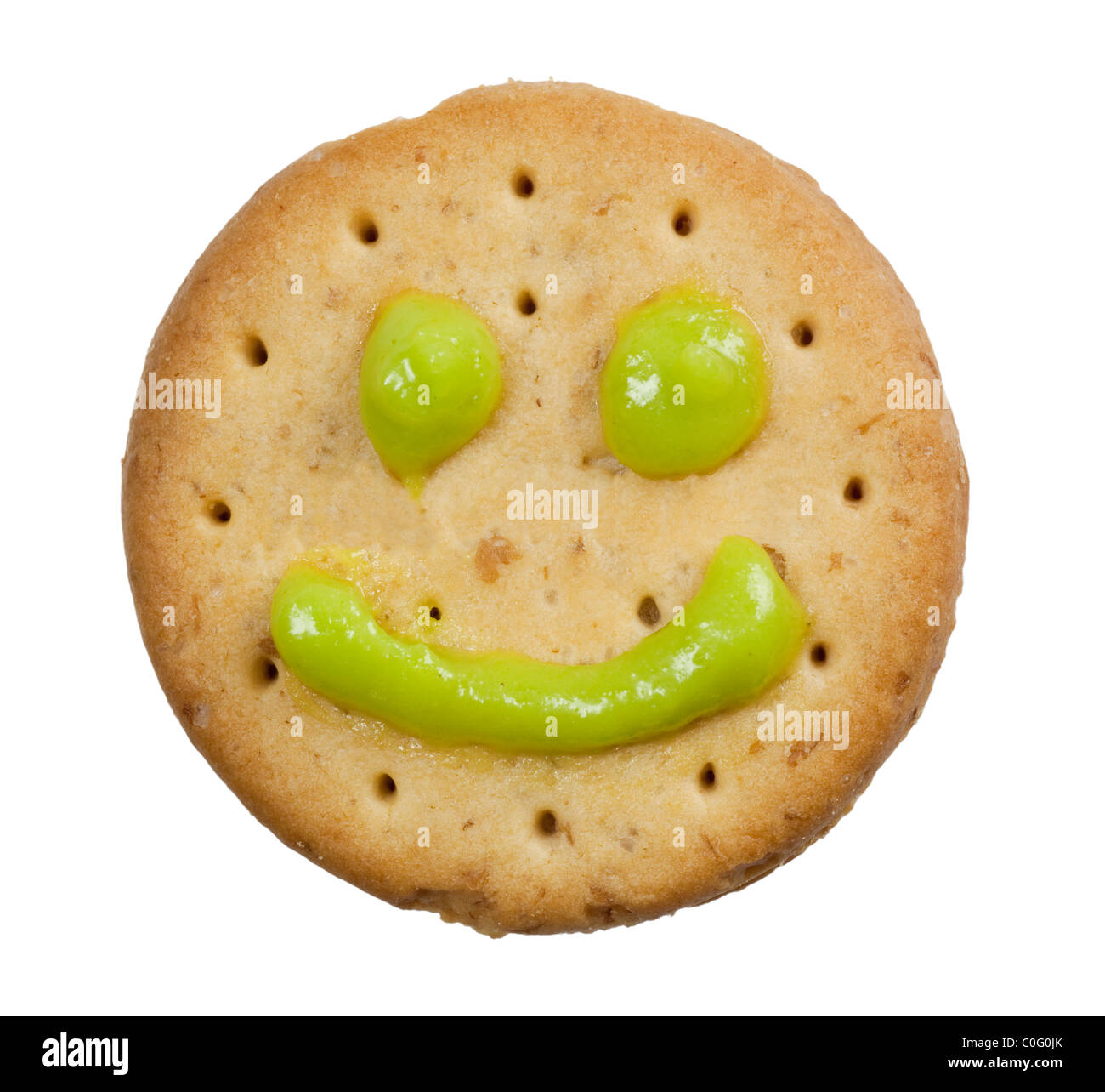 Biscuit with smiley face isolated on white background Stock Photo - Alamy