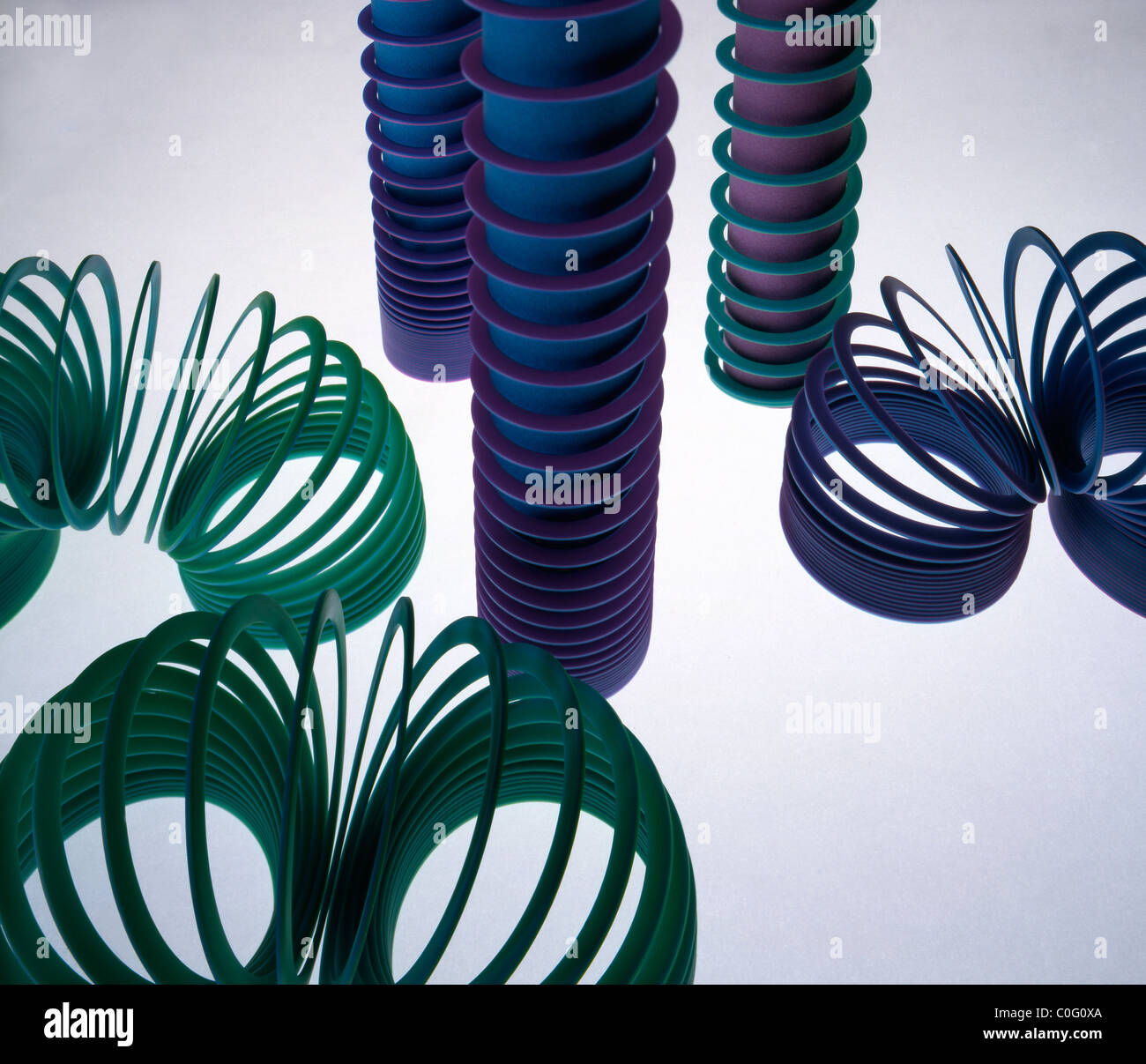 Geometric patterns are made with plastic slinky toys Stock Photo - Alamy