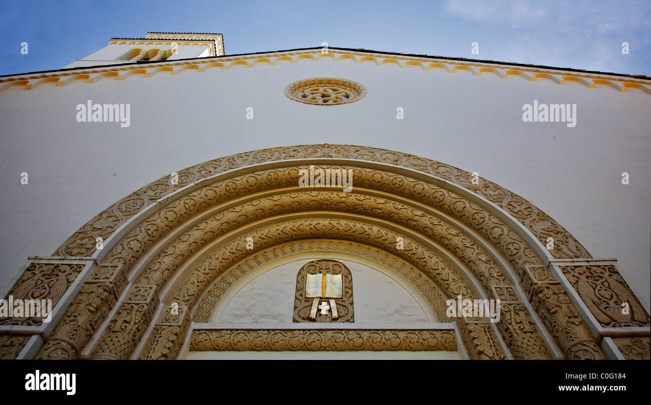 Ornate beige Church wall facade looking up with sky Stock Photo - Alamy