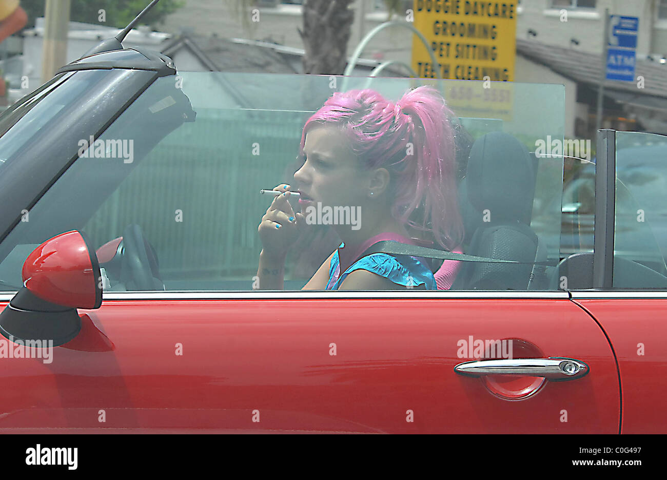 Lily Allen driving and smoking in a Mini Cooper with a friend Los ...