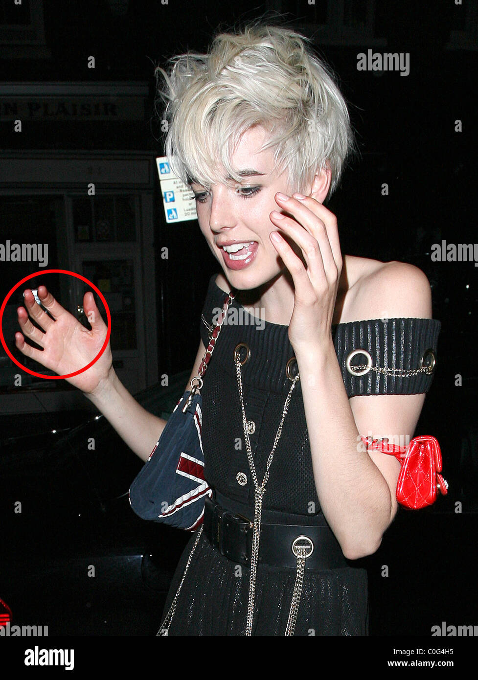 Agyness Deyn returns to her hotel, and almost falls over a photographer ...