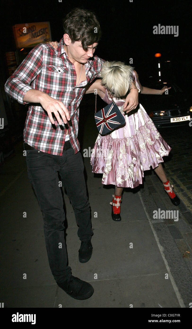 Agyness Deyn is escorted out of Punk nightclub and into a waiting taxi ...