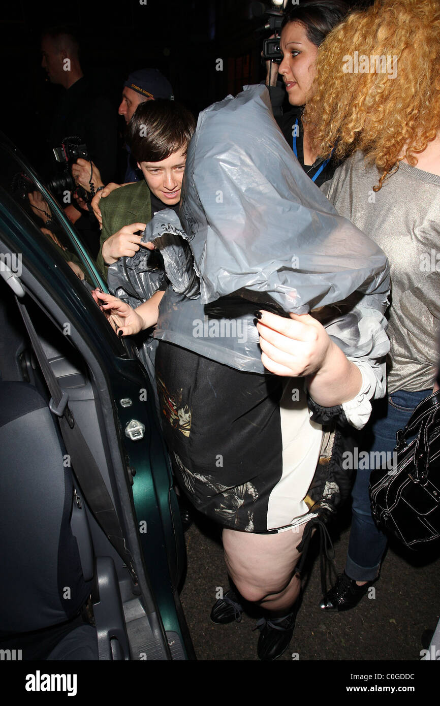 Beth Ditto is smuggled out the rear of Punk nightclub in a bin liner ...