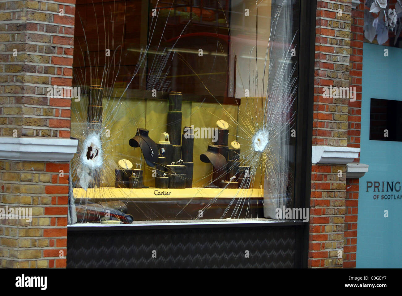 Damage to the shop window of the Cartier jewellery store on June 02 ...