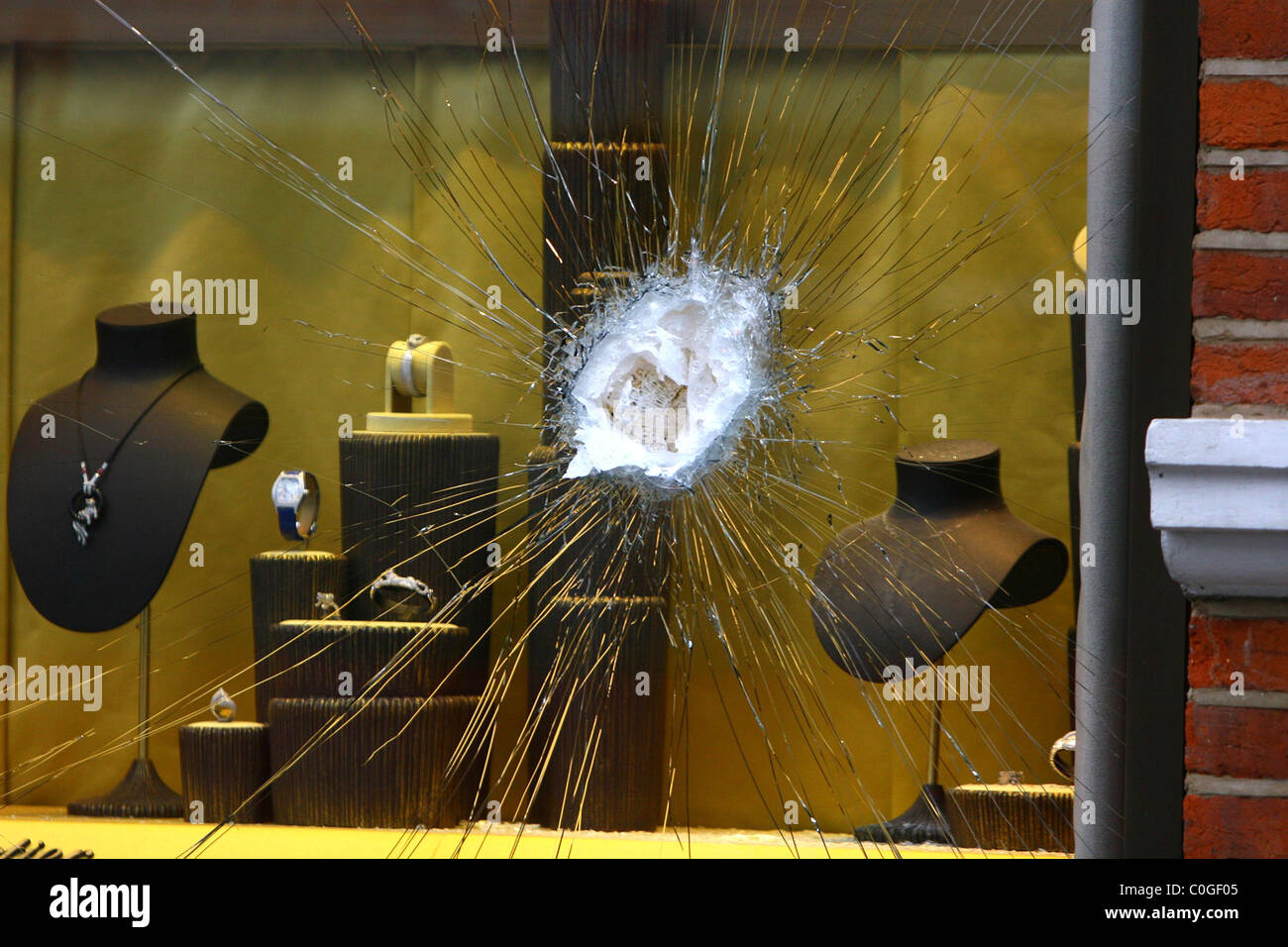 Damage to the shop window of the Cartier jewellery store on June 02 ...