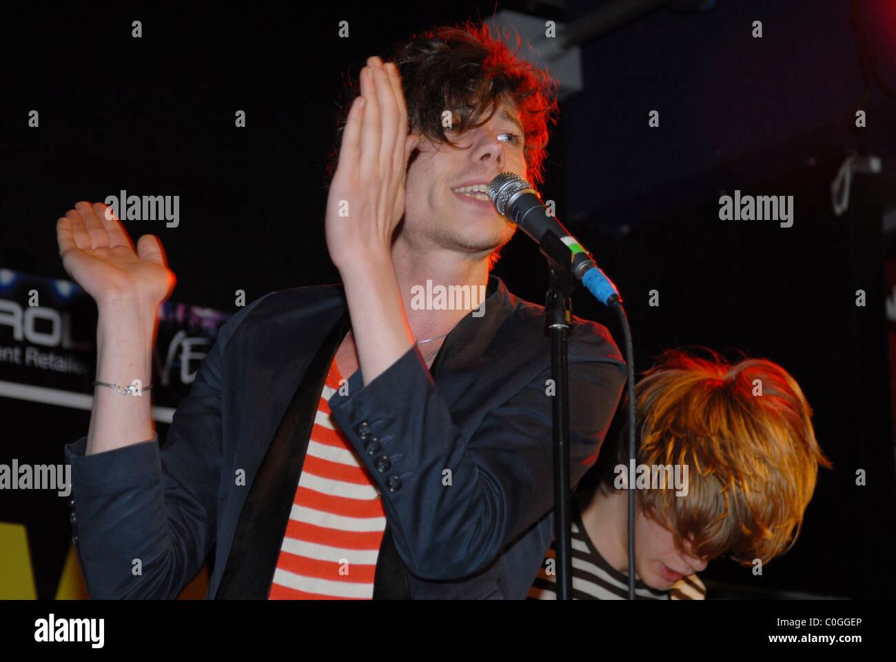 Joe Lean and The Jing Jang Jong performing live at Zavvi, Oxford Street London, England - 02.06. ...