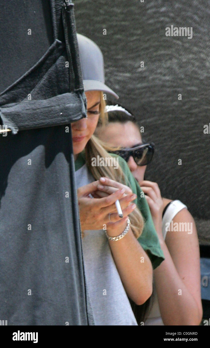 Lindsay Lohan smoking a cigarette on the film set of her upcoming movie ...