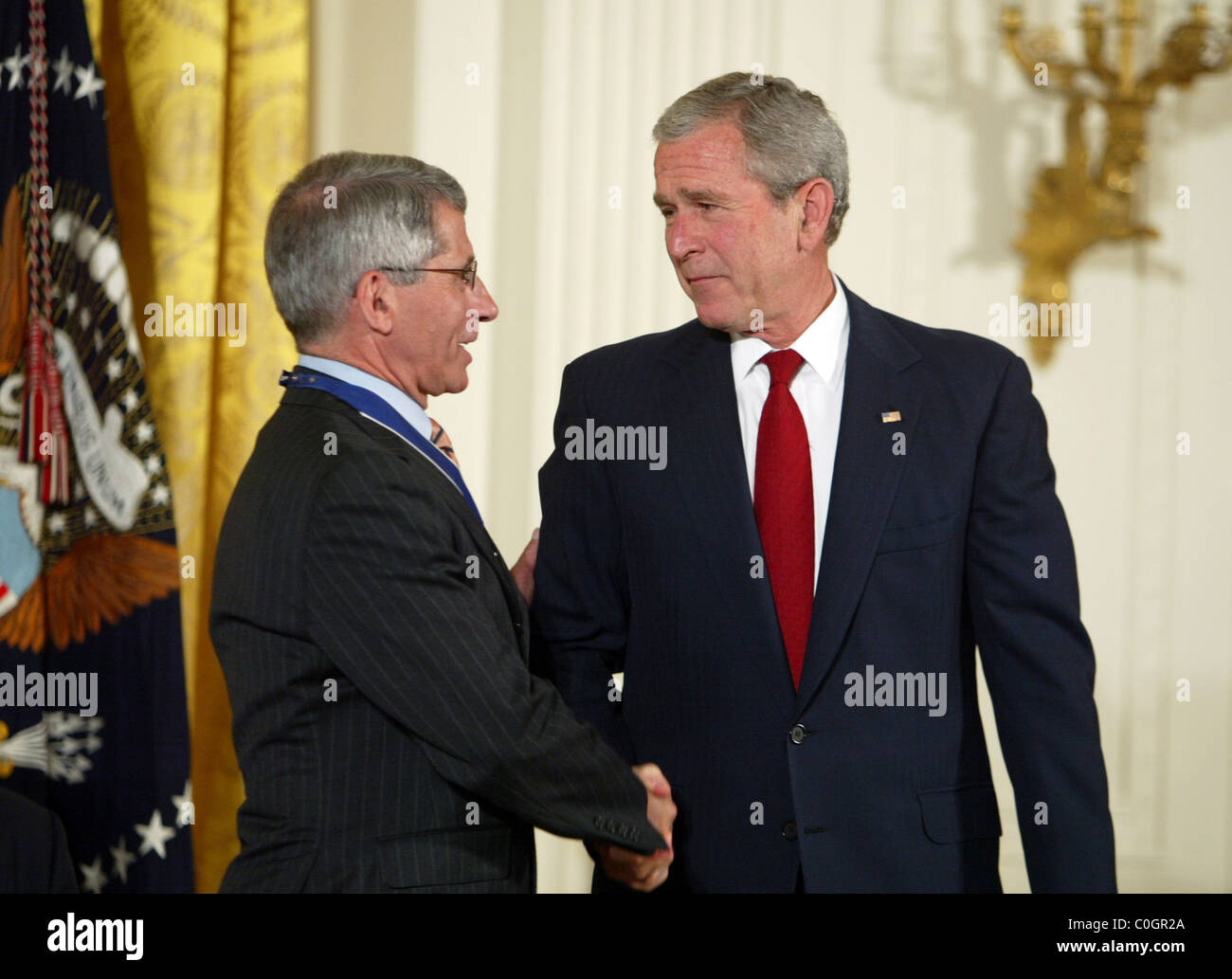President George W Bush presents the Medal of Freedom to Anthony Fauci ...