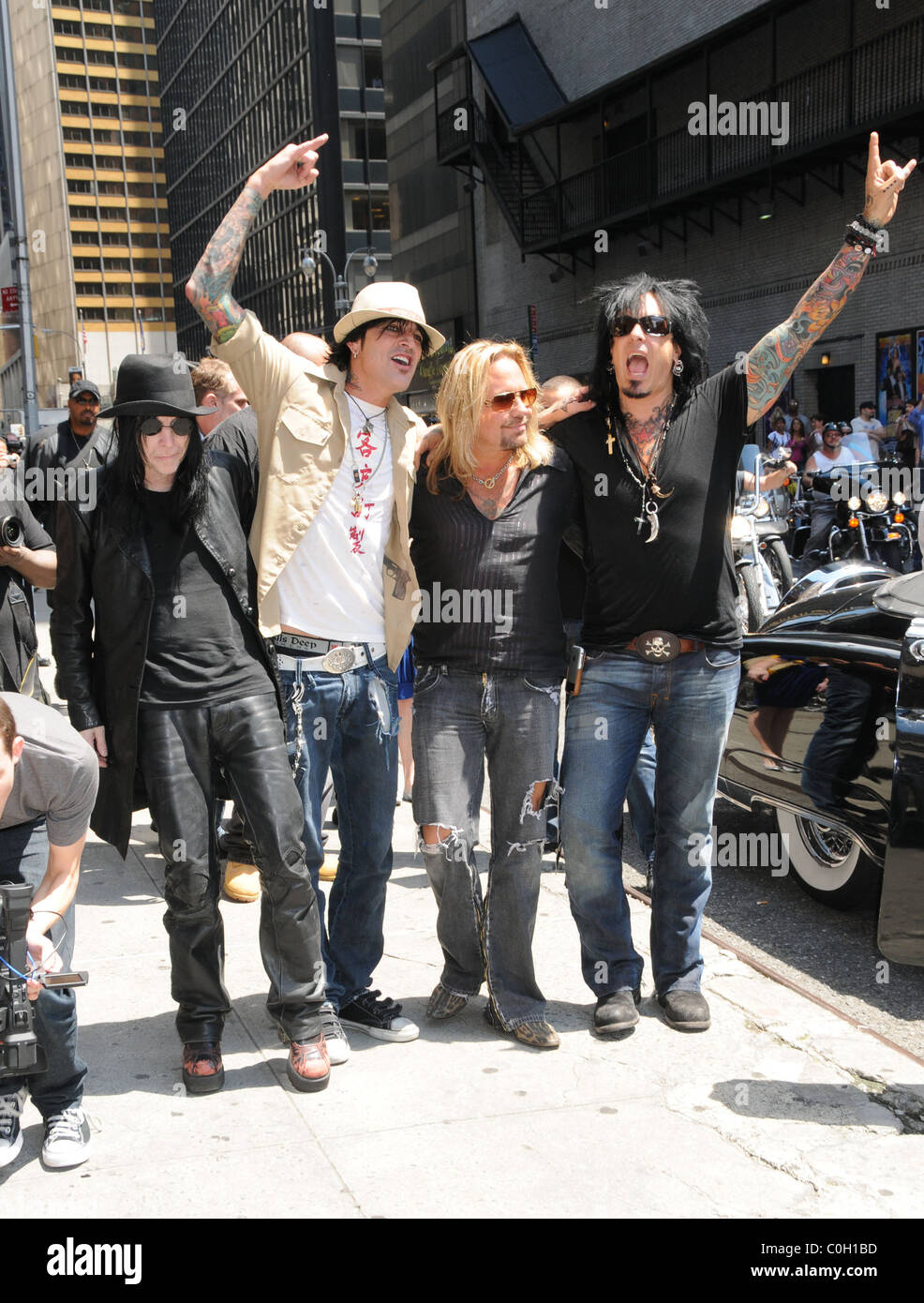 Motley Crue (Mick Mars, Tommy Lee, Vince Neil, Nikki Sixx) outside Ed ...