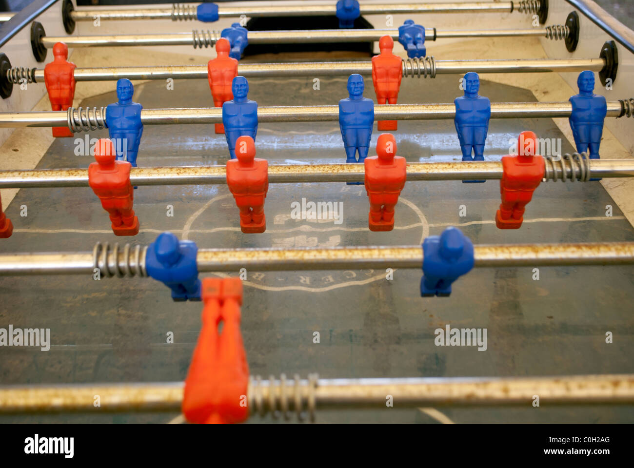 foosball men with red and blue Stock Photo - Alamy
