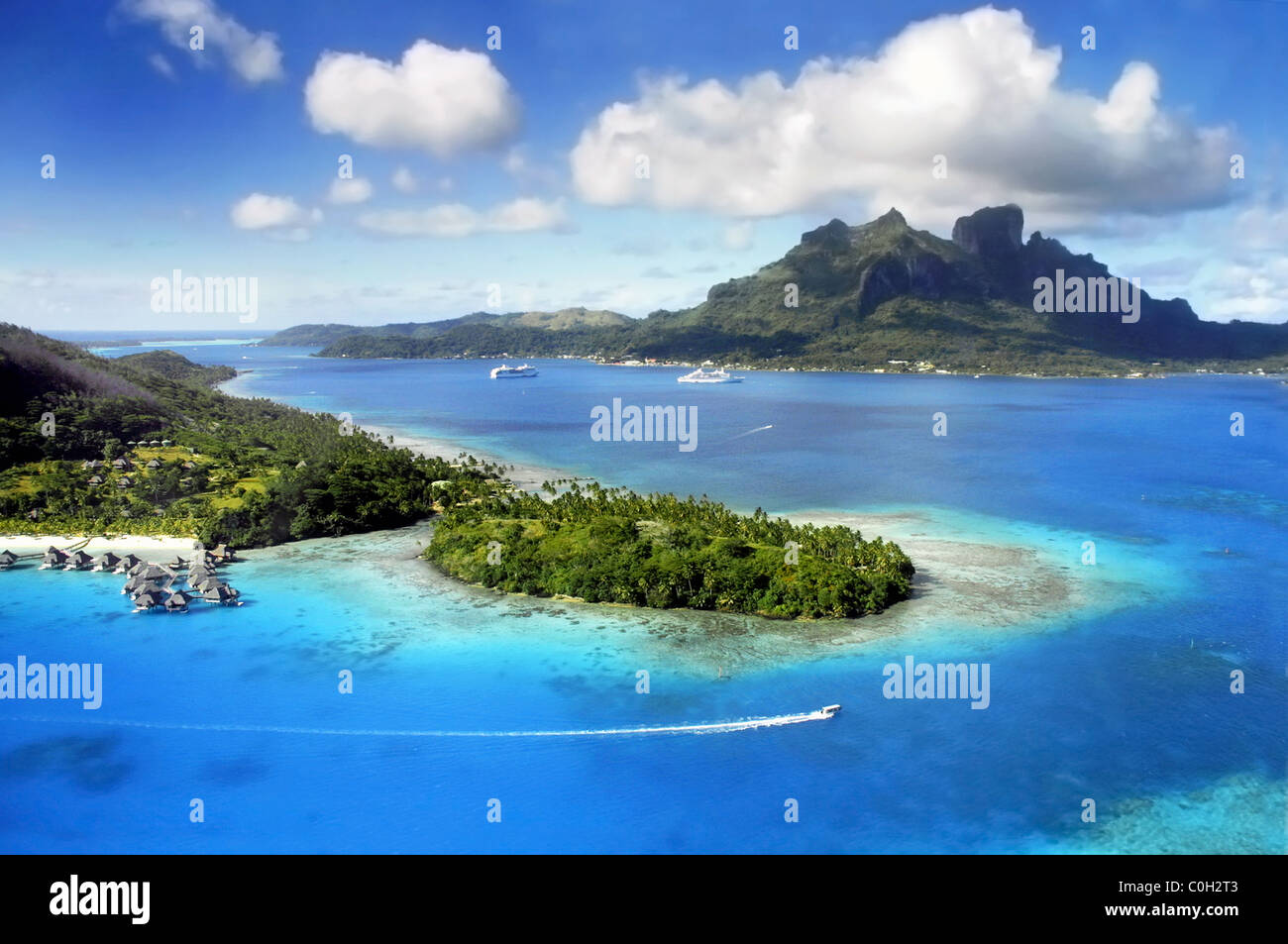 Aerial View of Bora Bora with Mount Otemanu in background and coral ...