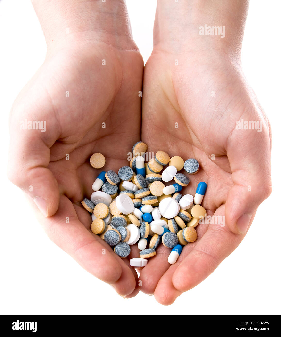 Hands offering Medicines isolated on white background Stock Photo - Alamy