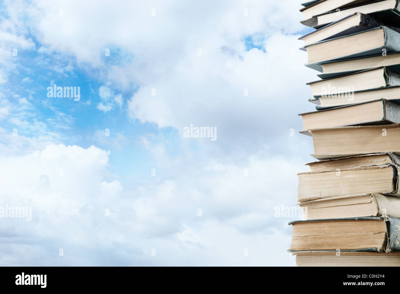 many books on blue sky background Stock Photo - Alamy