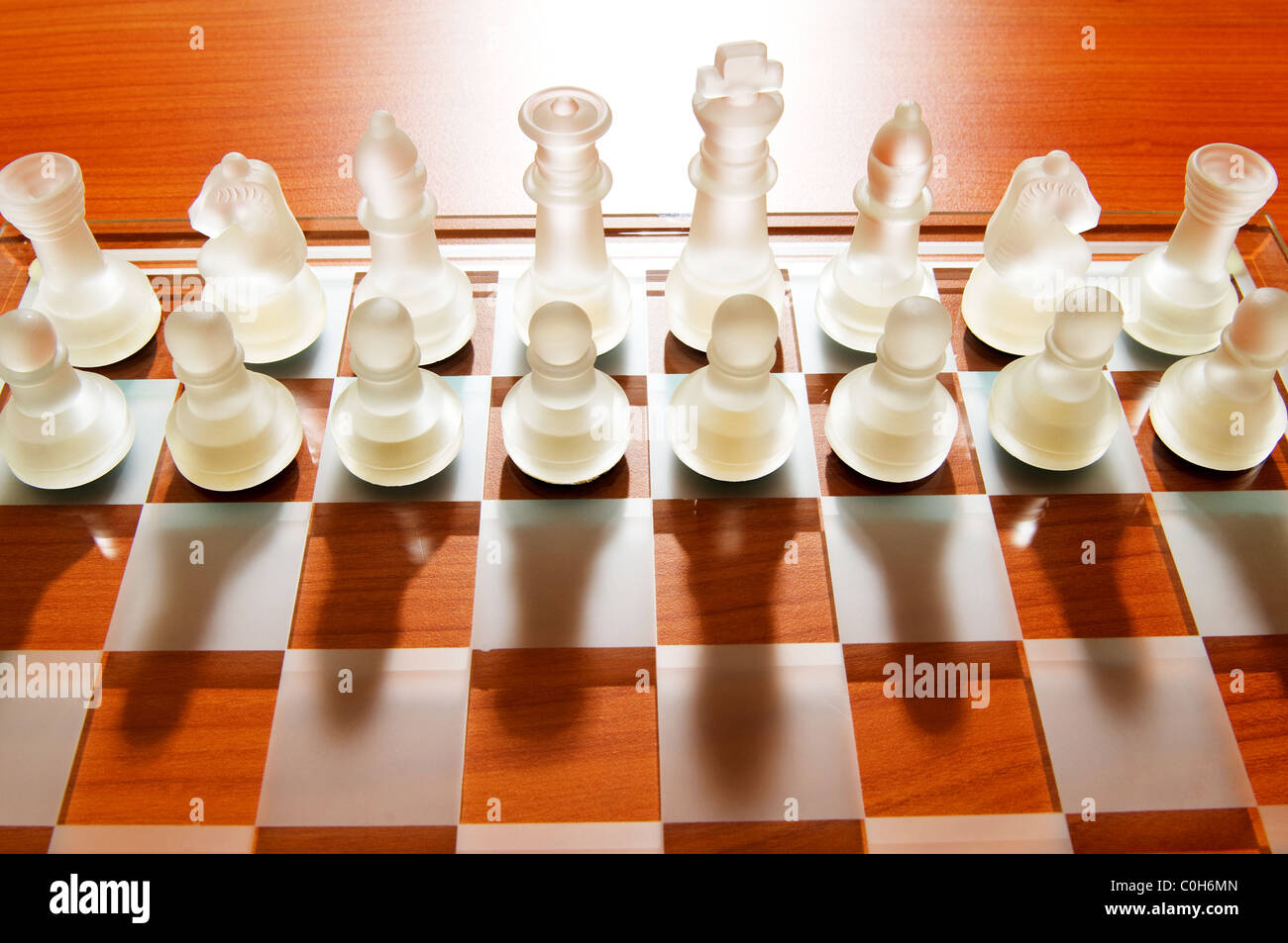 Set of chess figures on the playing board Stock Photo - Alamy