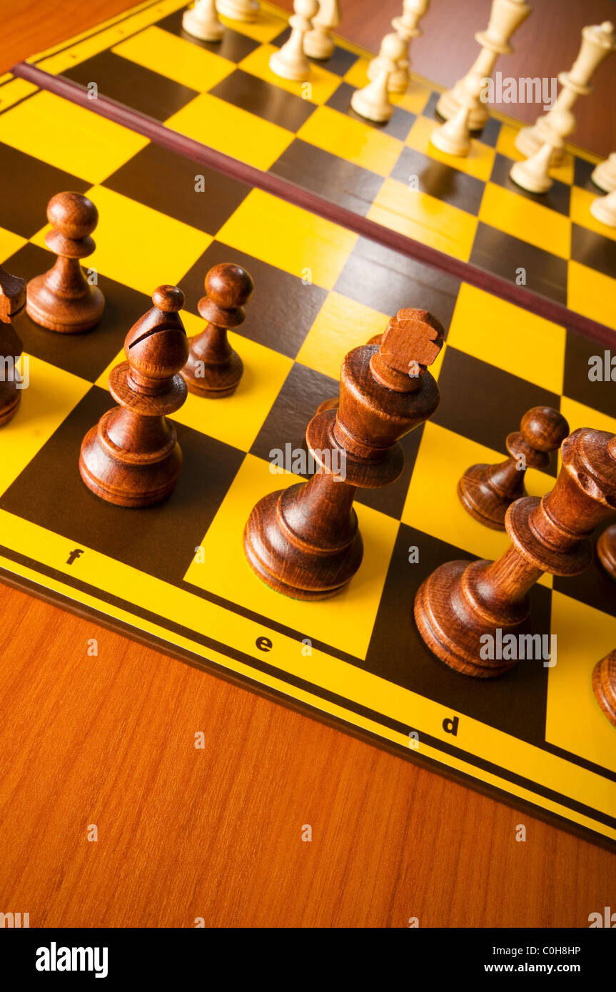 Set of chess figures on the playing board Stock Photo - Alamy