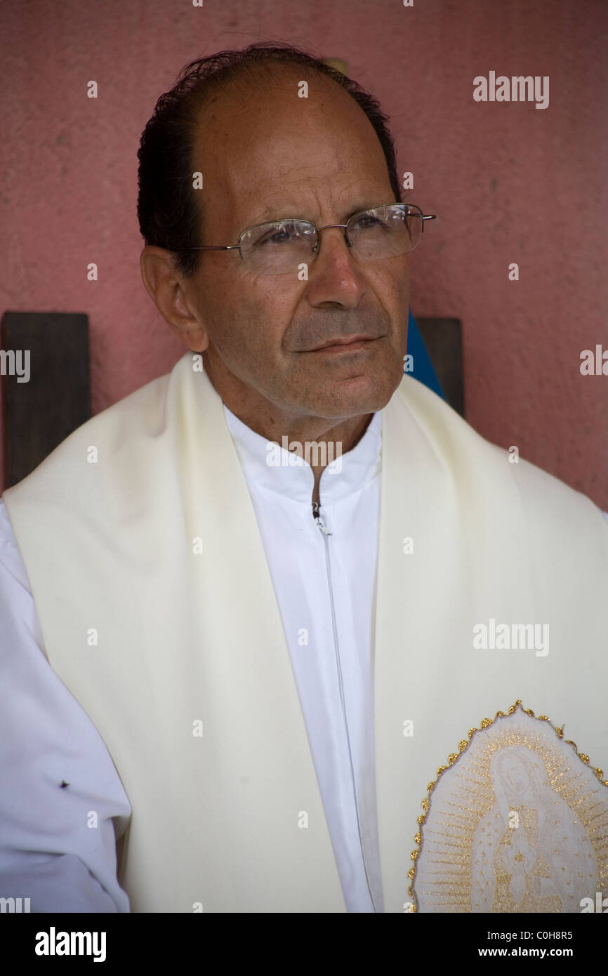 Catholic priest Alejandro Solalinde gives a mass in his shelter for ...