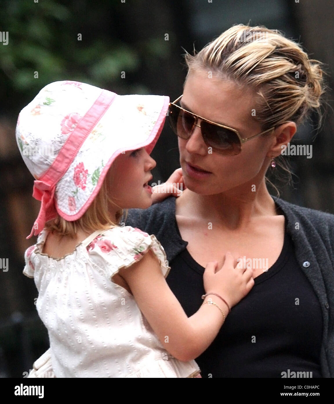 Heidi Klum and her family take a walk in the West Village and stop off ...