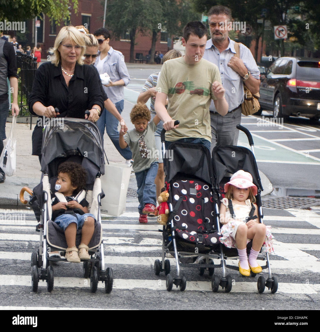 Heidi Klum and her family take a walk in the West Village and stop off ...