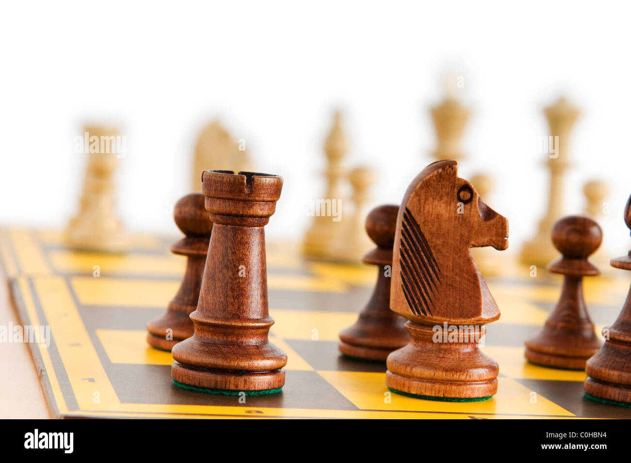 Set of chess figures on the playing board Stock Photo - Alamy
