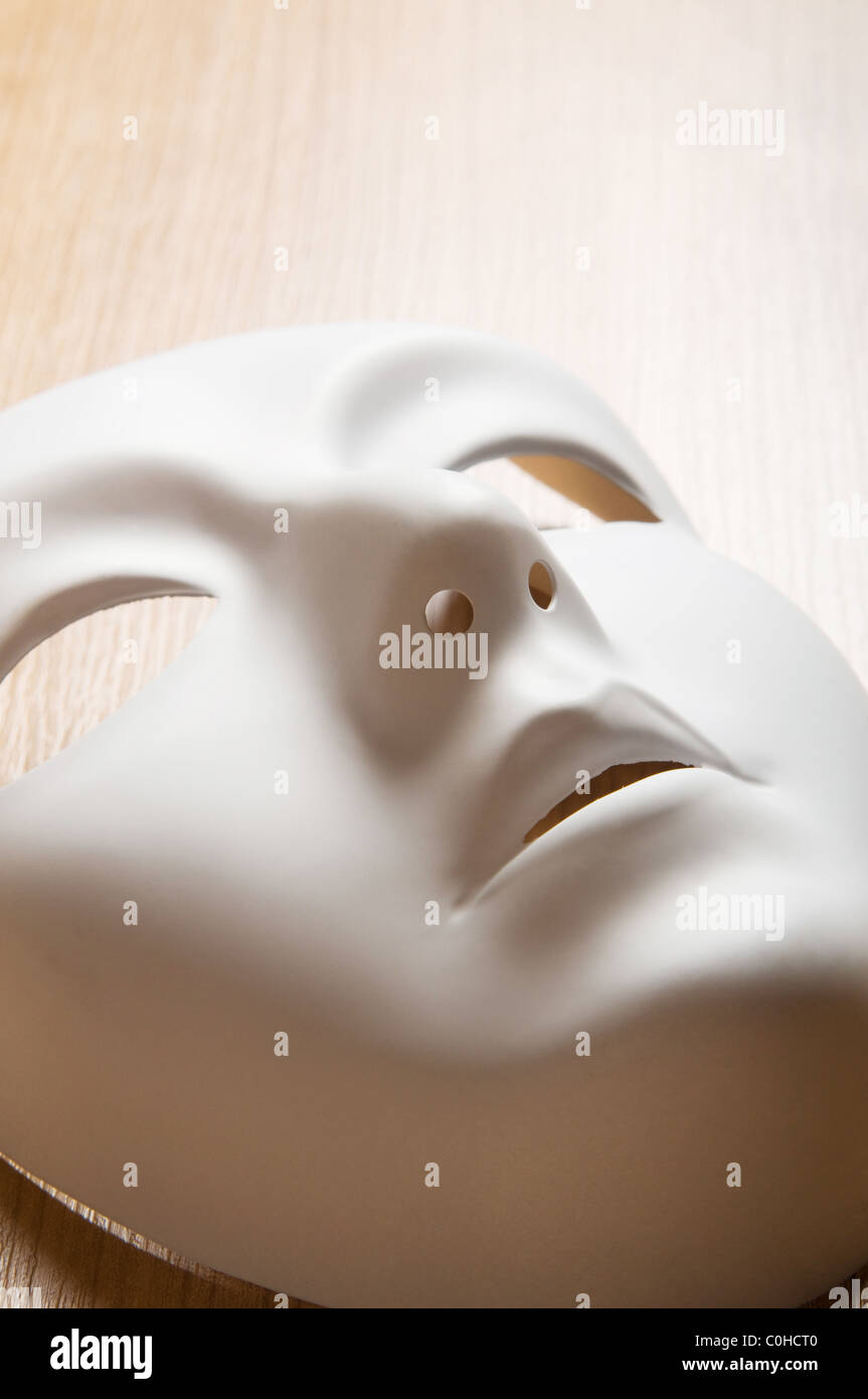 Theatre concept with the white plastic masks Stock Photo - Alamy