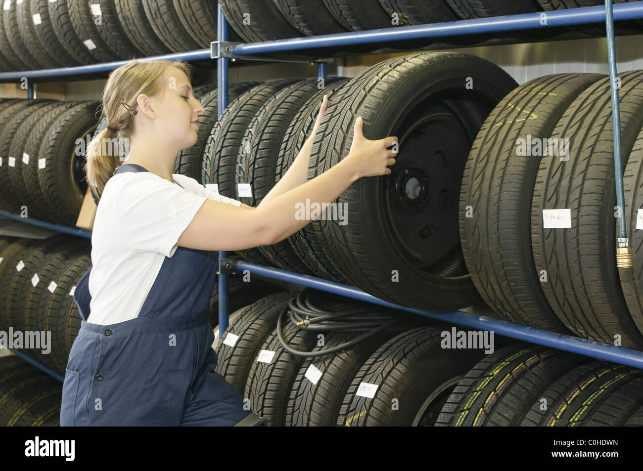 Tire store team hi-res stock photography and images - Alamy