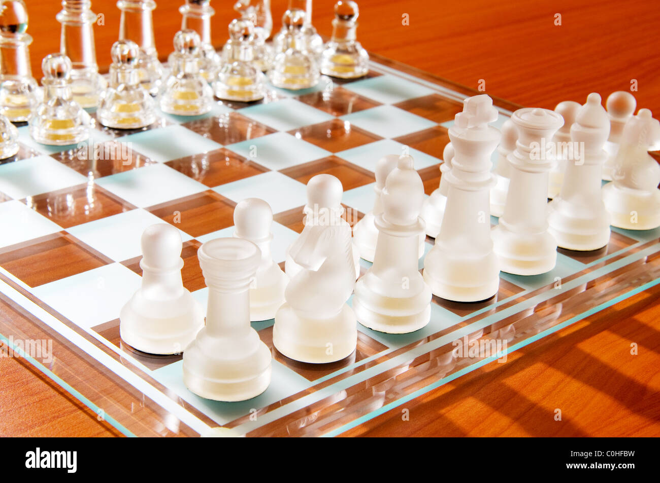 Set of chess figures on the playing board Stock Photo - Alamy