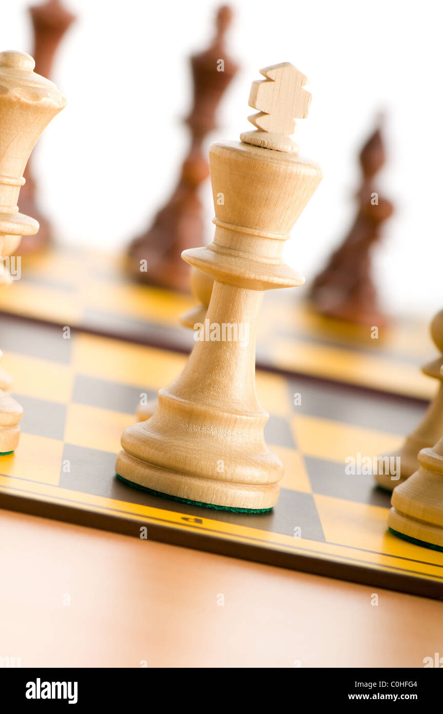 Set of chess figures on the playing board Stock Photo - Alamy