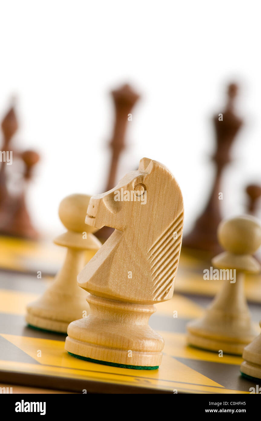 Set of chess figures on the playing board Stock Photo - Alamy