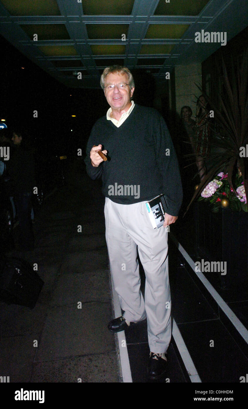 Jerry Springer smokes a cigar outside the Dorchester Hotel London ...