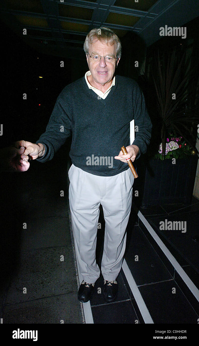 Jerry Springer smokes a cigar outside the Dorchester Hotel London ...