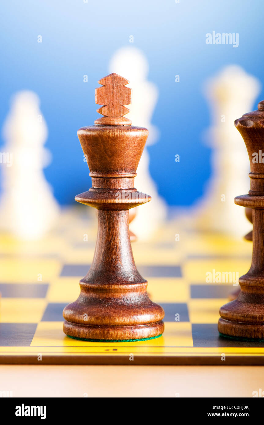 Set of chess figures on the playing board Stock Photo - Alamy