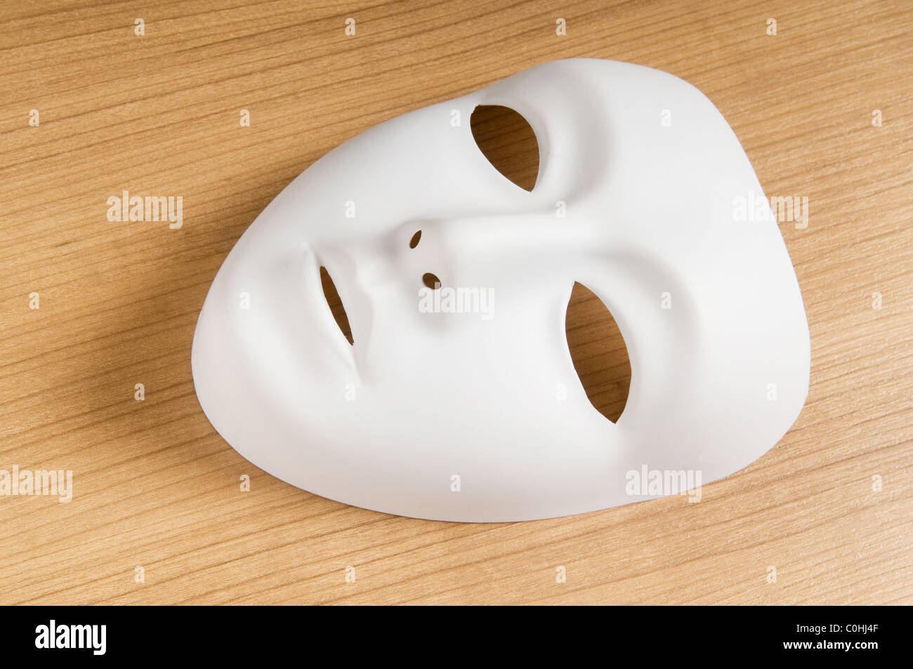 Theatre concept with the white plastic masks Stock Photo - Alamy