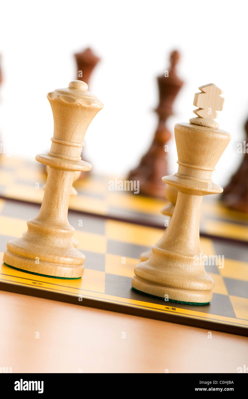 Set of chess figures on the playing board Stock Photo - Alamy