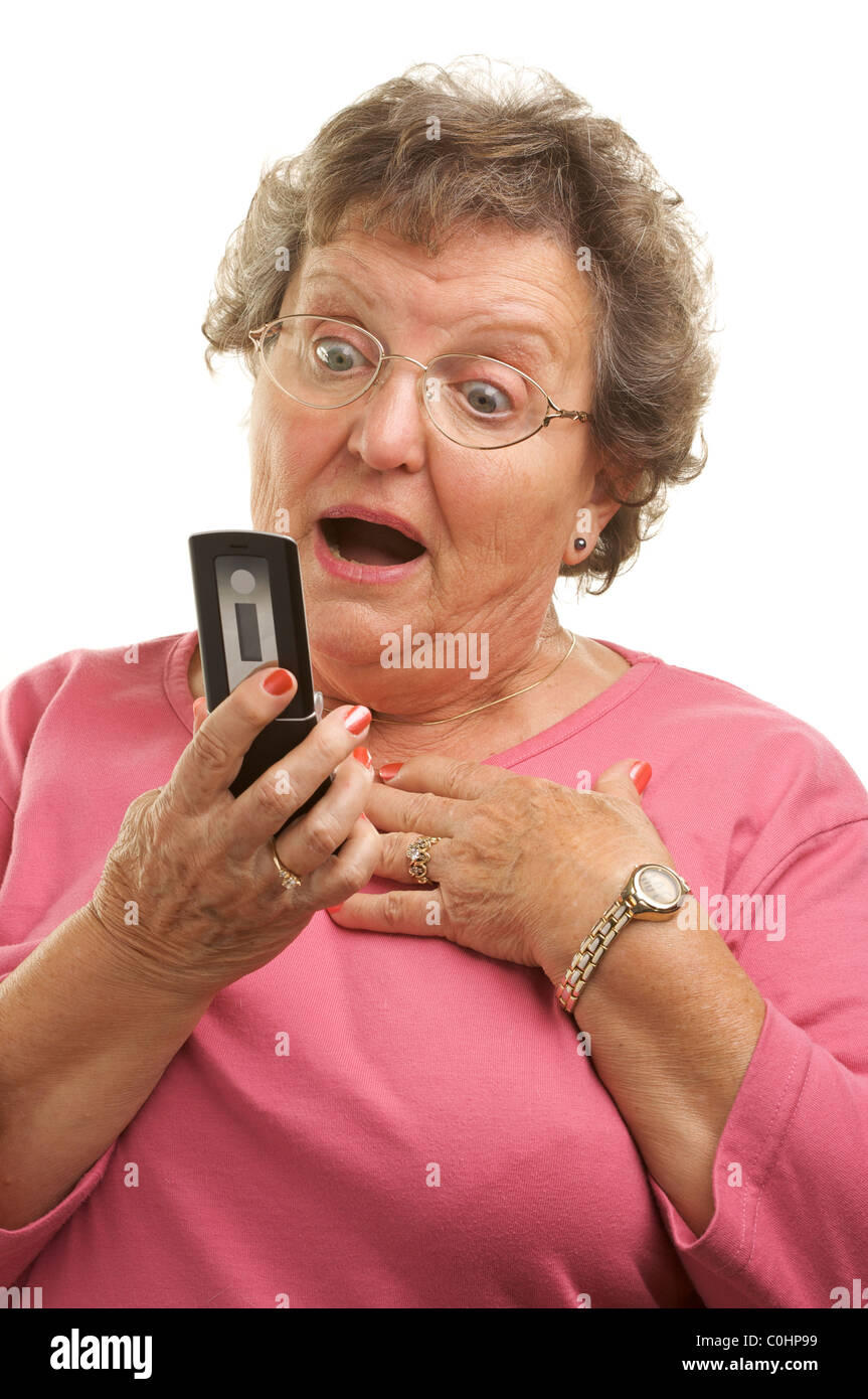 Elderly woman shocked phone hi-res stock photography and images - Alamy
