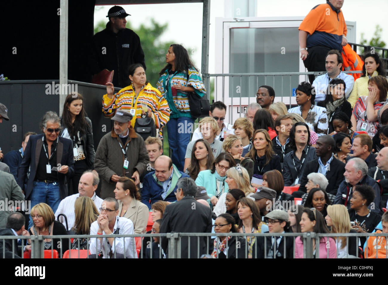 Kate Middleton (C) and Roberto Cavalli attends Nelson Mandela's 90th ...