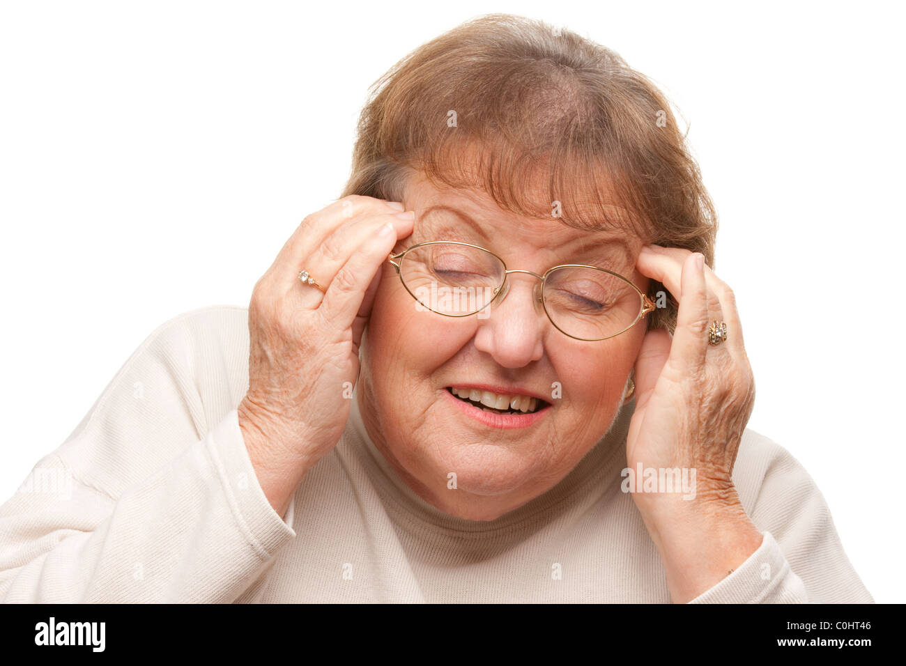 Woman portrait hands on temples hi-res stock photography and images - Alamy