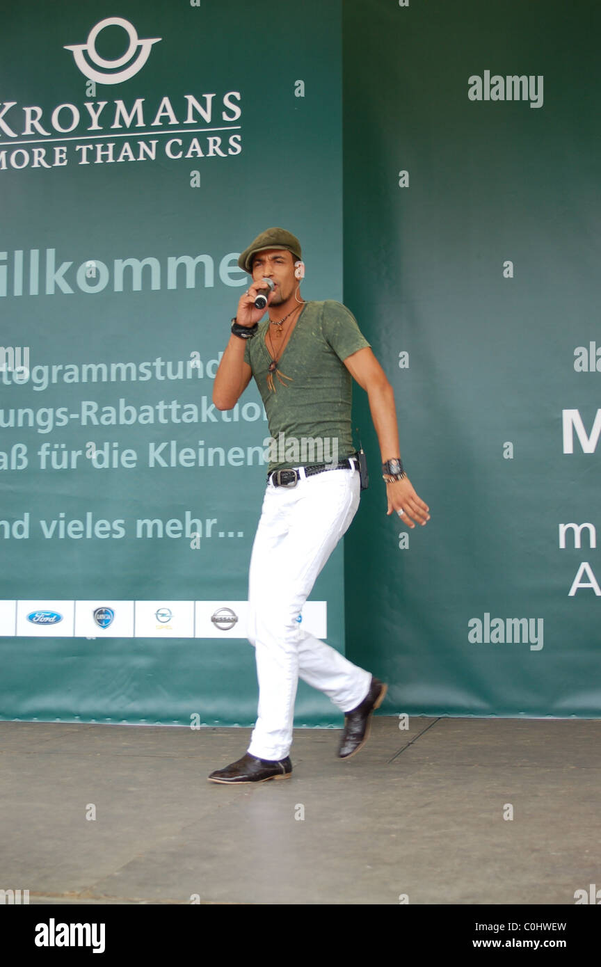 Mark Medlock performing live at a party for car dealership Kroymans. It ...