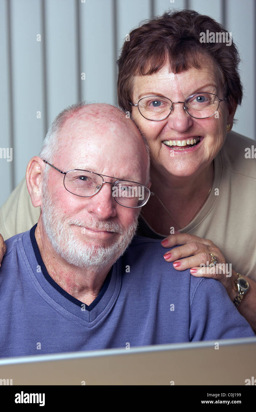 Two senior adults working together hi-res stock photography and images ...
