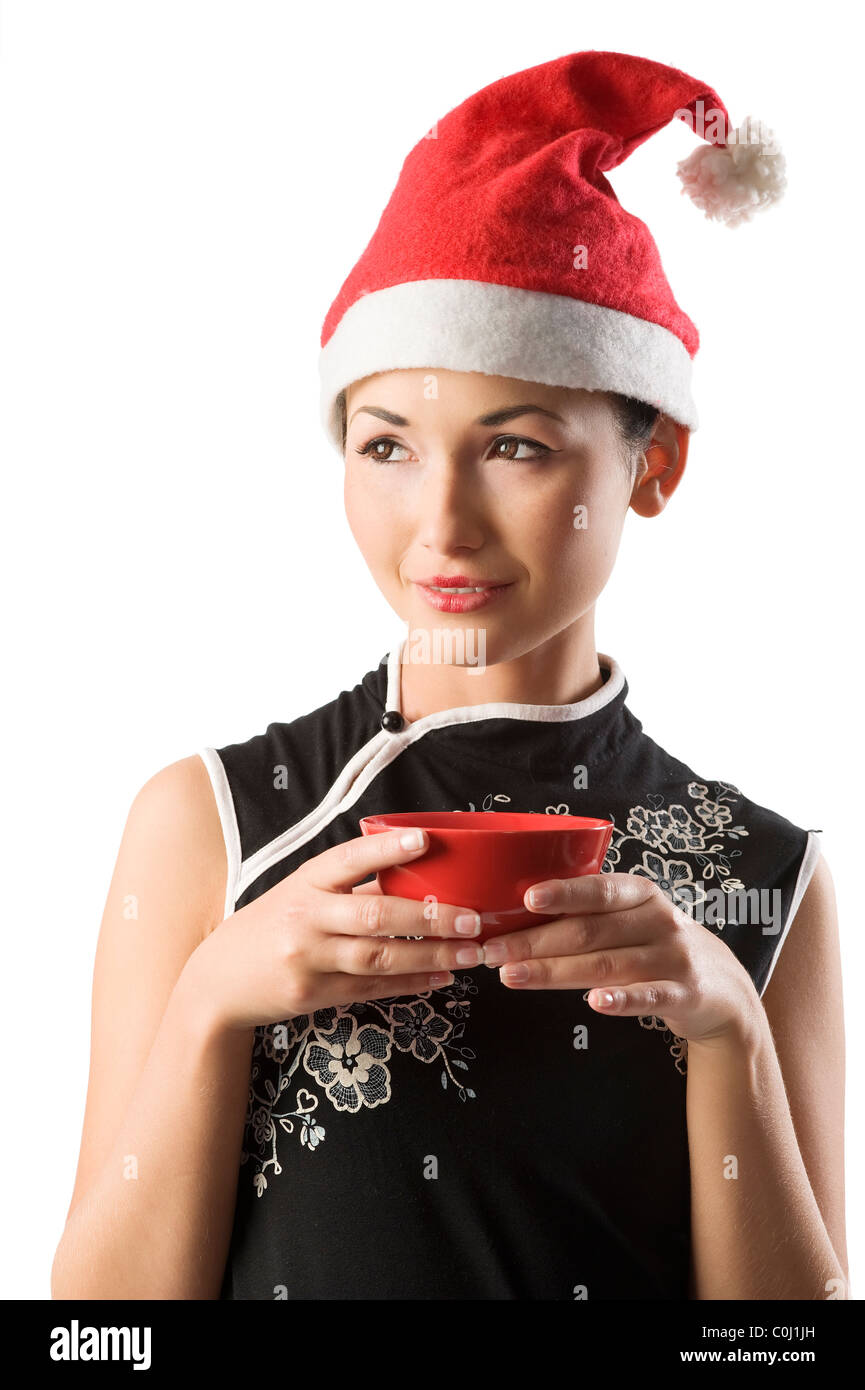 asian santa claus girl holding traditional red chinese cup for rice ...