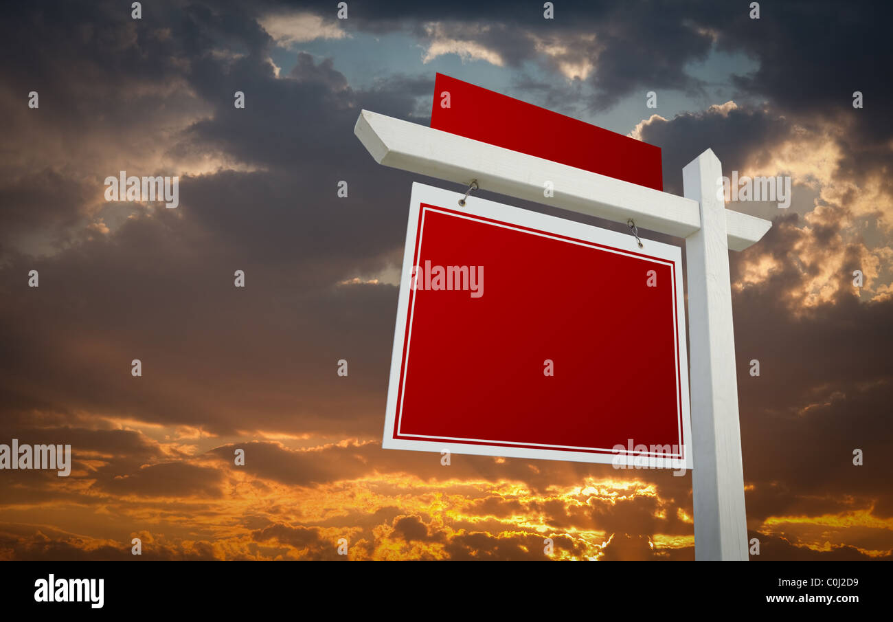 Blank Red Real Estate Sign Over Sunset Sky Ready For Your Own Message ...