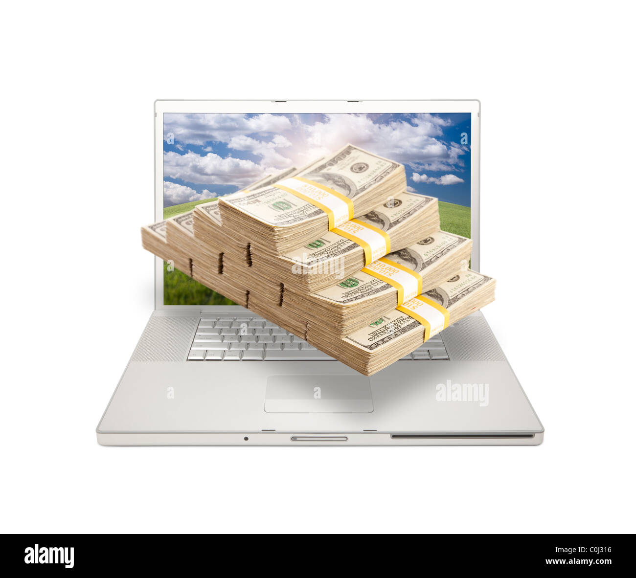 Silver Computer Laptop Isolated on White with Stacks of Hundred Dollar ...
